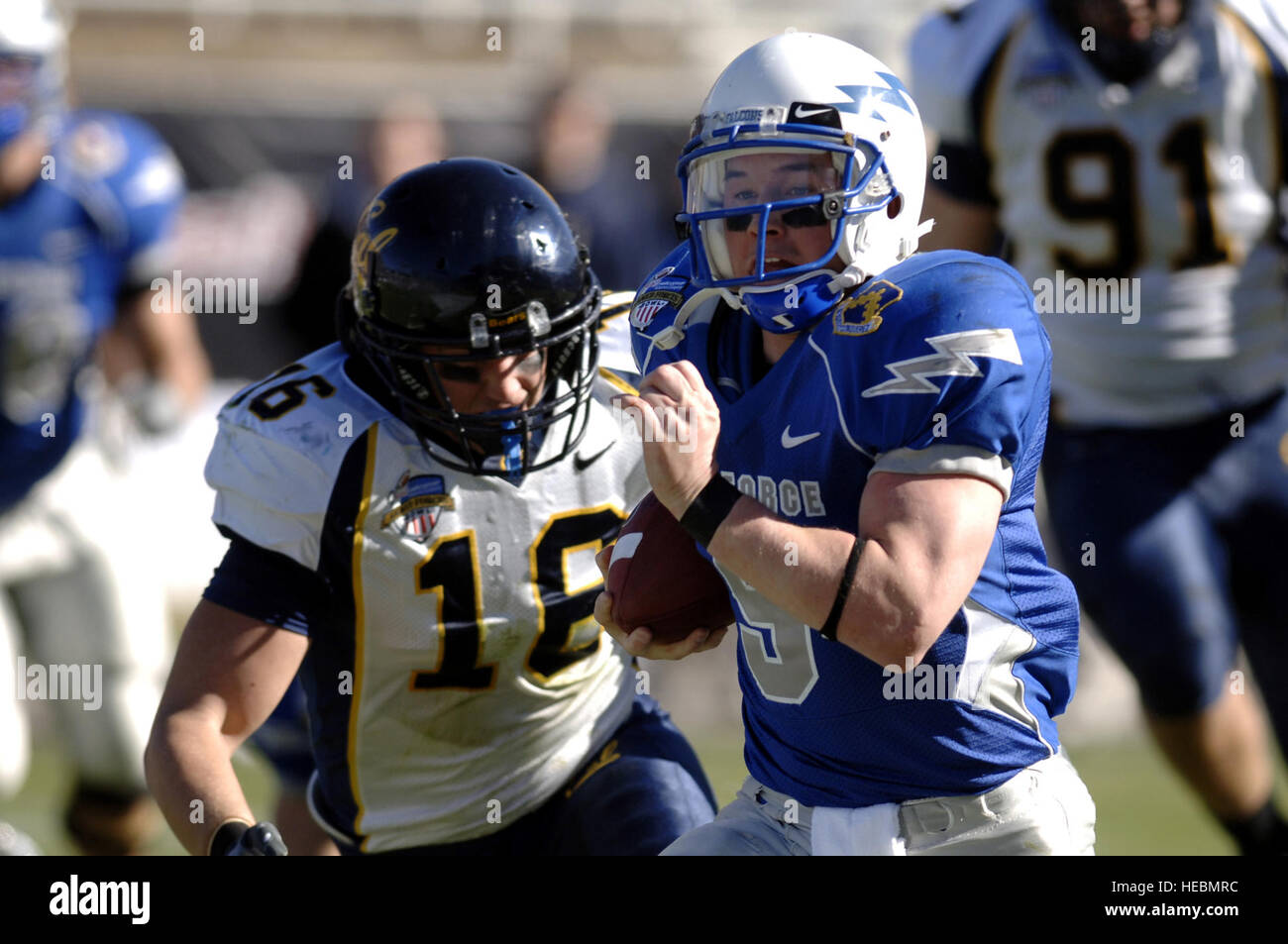U.S. Air Force Academy senior quarterback Shaun Carney eludes pressure ...