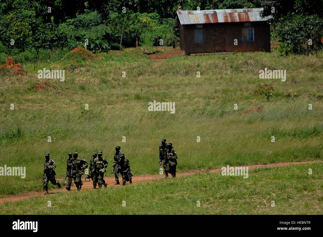 Soldiers with the Uganda people's defence force are running 5.4 miles ...