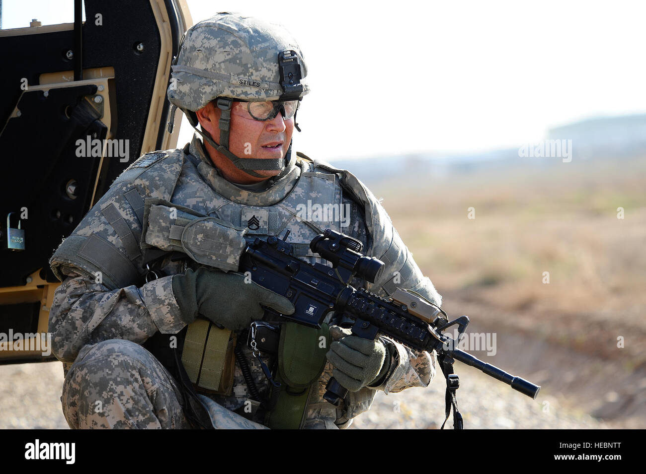 Army Staff Sgt. Robert Stiles provides security for a casualty ...