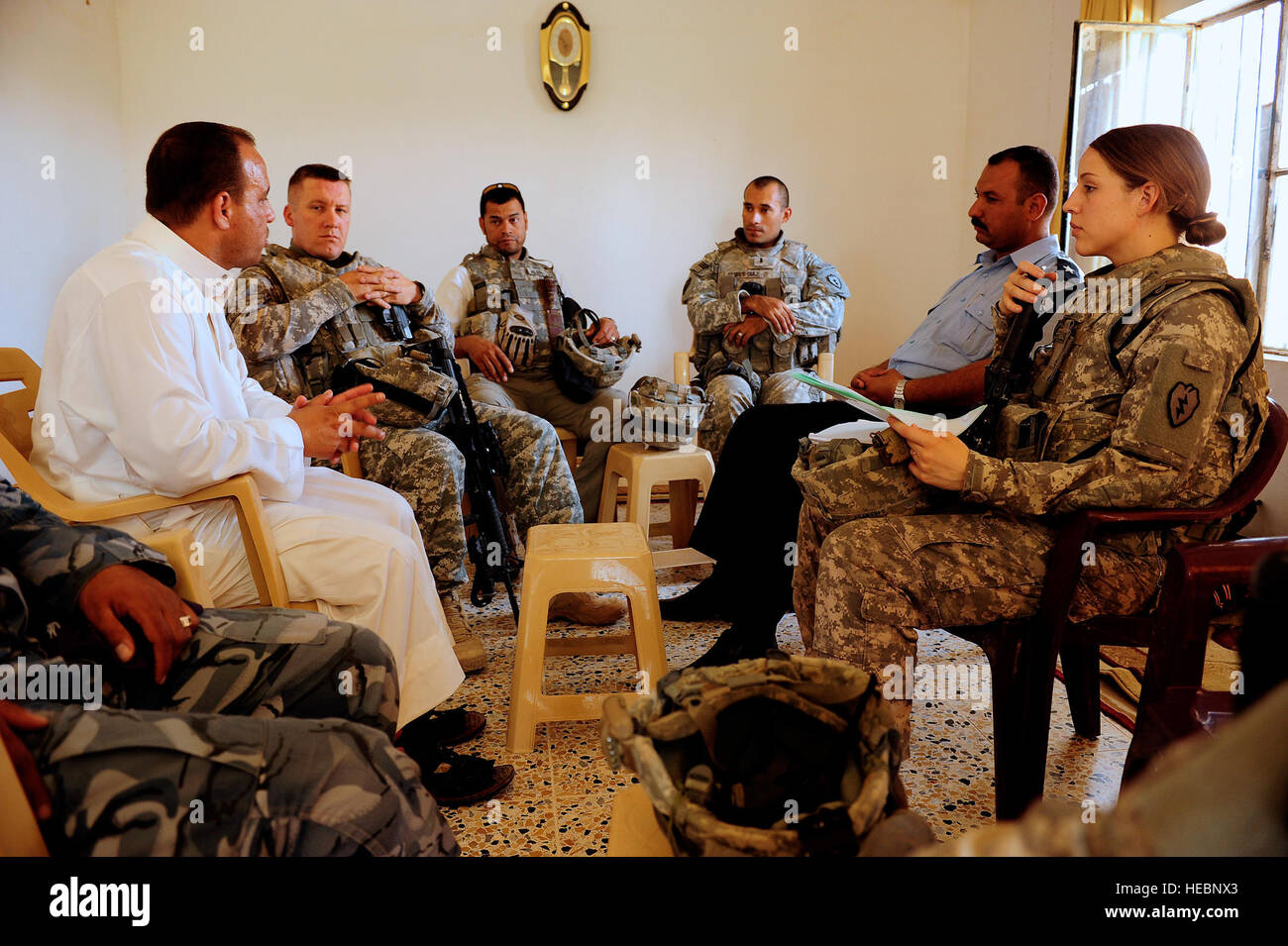 U.S. Army 1st Lt. Julie Leggett (right), Executive Officer for Security ...