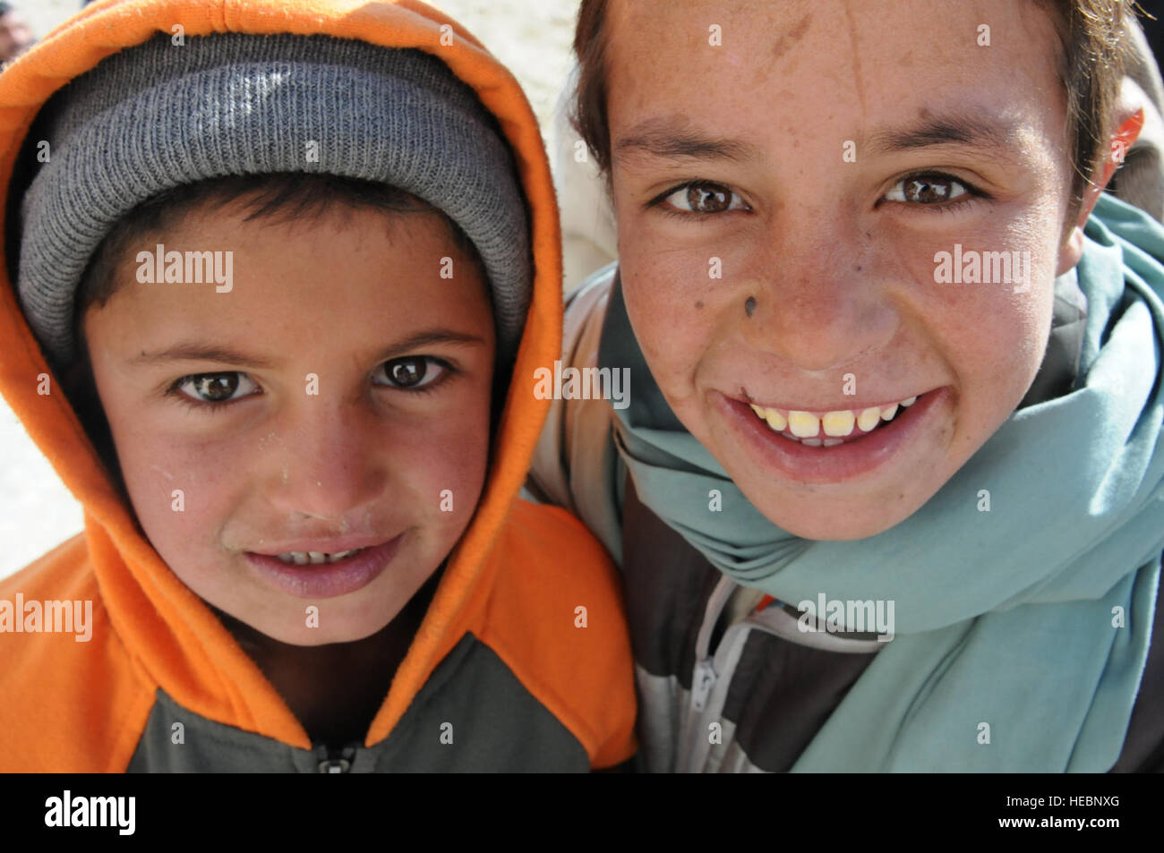 Afghan boys smile for a photo outside of an orphanage in Sharana ...