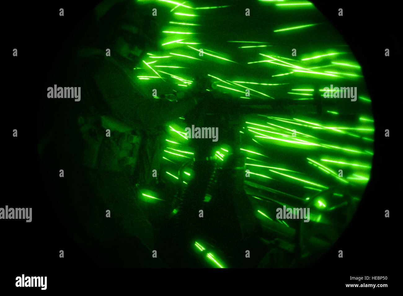 A crew chief from Marine Helicopter Light Attack Squadron 773 conducts ...