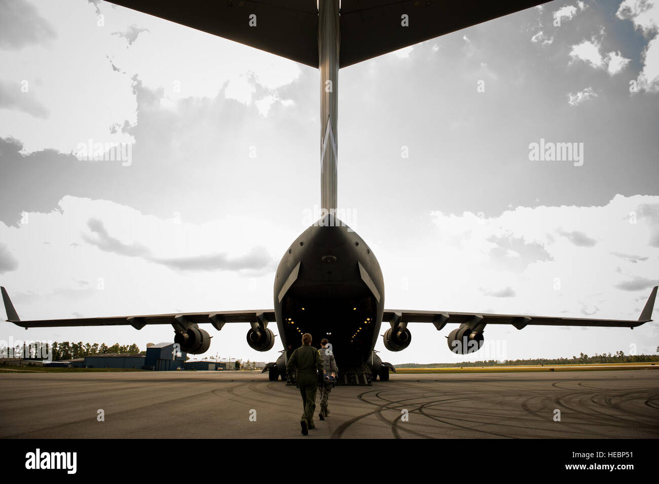 Aeromedical evacuation members load a patient on to a West Virginia Air ...