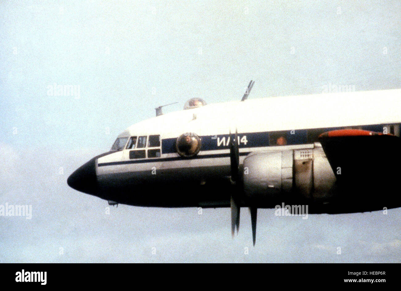 An air-to-air left side close-up view of a Soviet I1-14 Crate aircraft ...