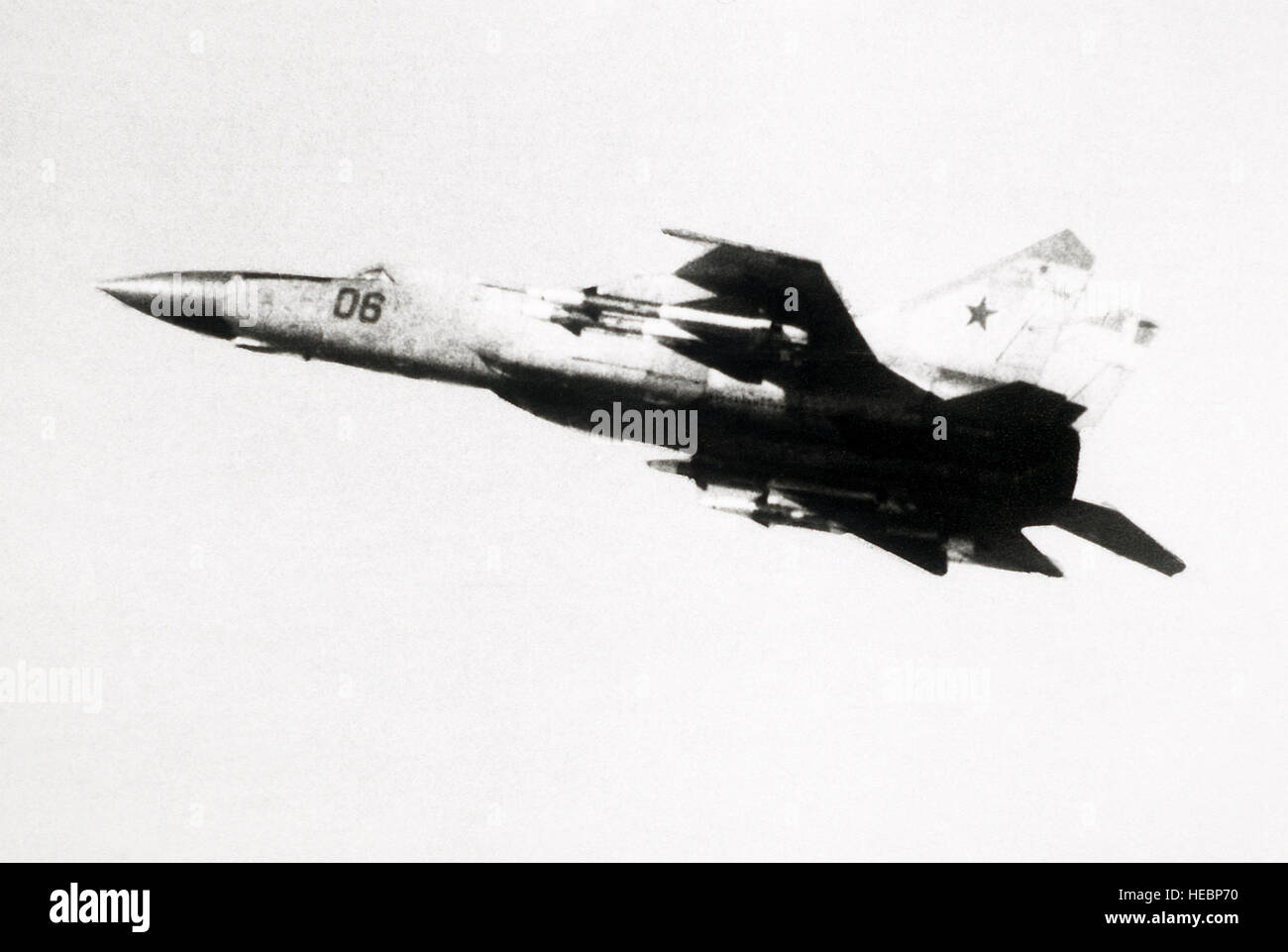 An air-to-air left side view of a Soviet MiG-25 Foxbat-E aircraft with ...