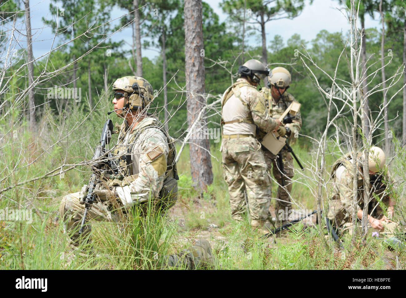 A Special Operations Weather Team member provides security while his ...