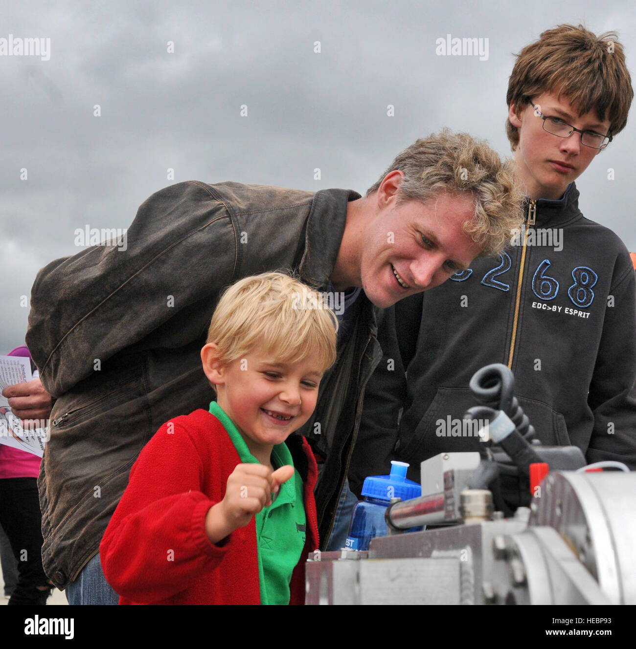 Lucas Baillieesc, left, puts a bottle in the hand of a Rematec F6A ...