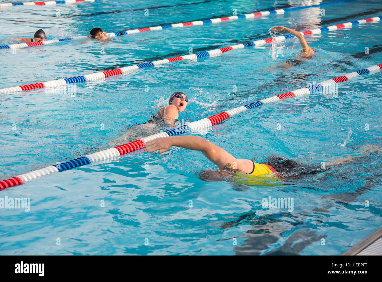 Team Scott members participate in a 300 meter swim during the “Splash N ...