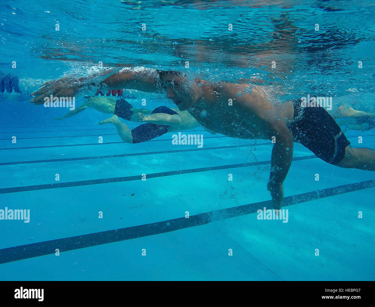 Team Scott members complete the 300 meter swim during the “Splash N ...