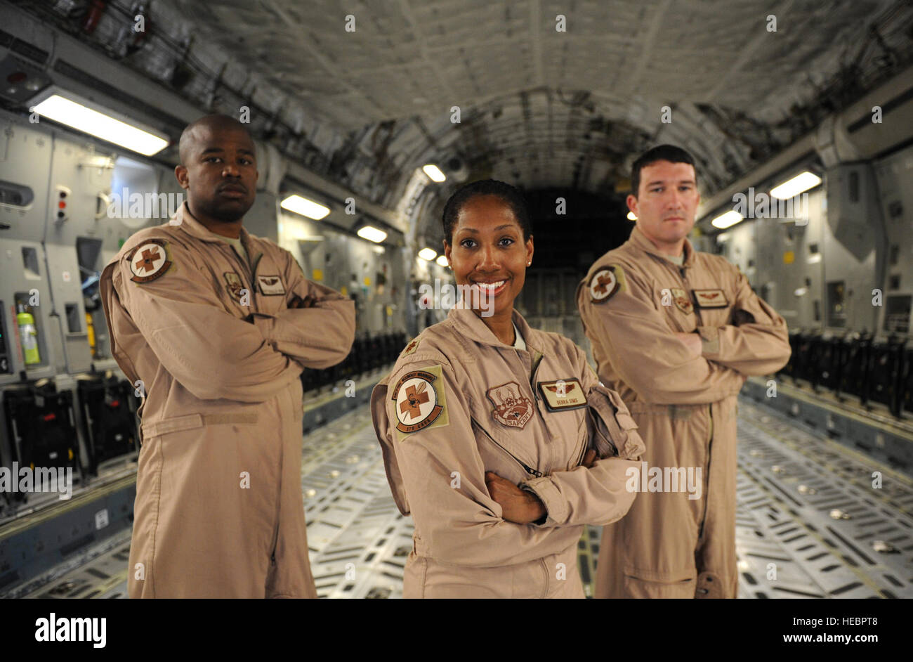 (From left) Staff Sgt. Donald Ennis, a 379th Expeditionary Aeromedical ...