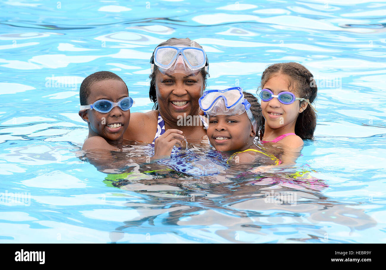 Brandon Respress, 9, Ruby Cooper, military retiree, Ariana Respress, 7 ...
