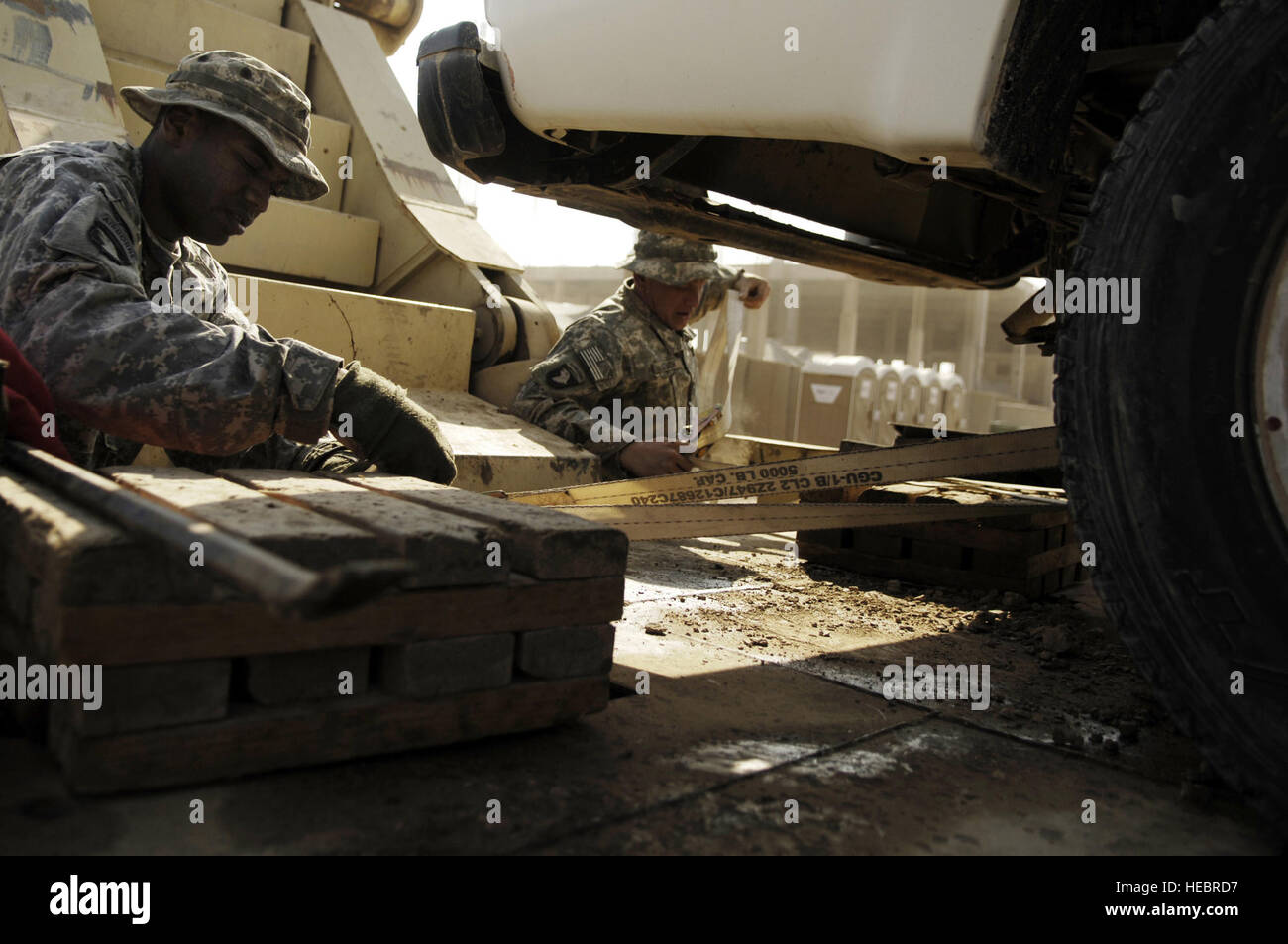 U.S. Army Sgt. Elijah Turner (left), and Sgt. Jeremy Leach (right), of ...