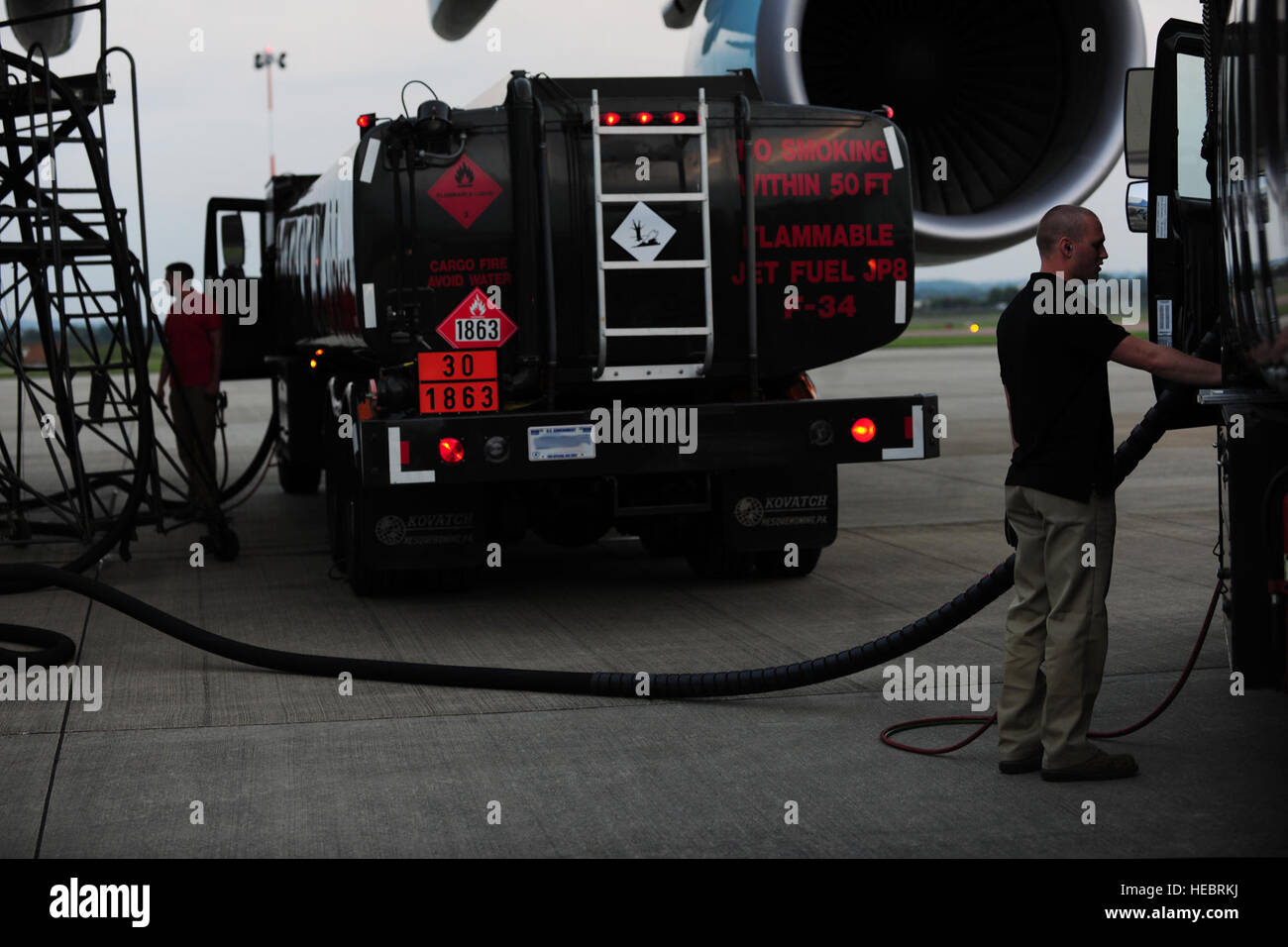 U.S. Air Force Airman 1st Class Samuel Massey, right a fuels specialist ...