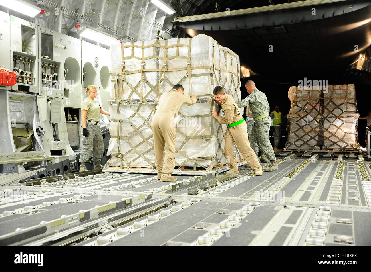 U.S. airmen with the 386th Expeditionary Logistics Readiness Squadron ...