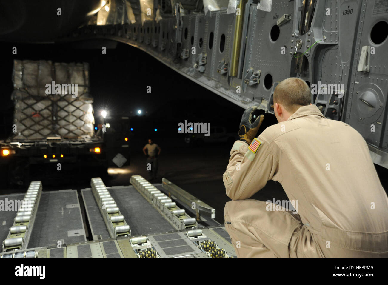 U.S. Air Force Airman 1st Class C.J. Vandenburg, foreground, a ...