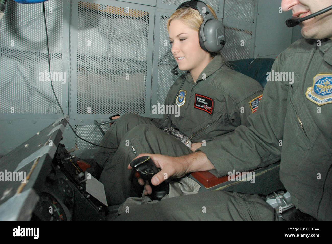 Miss USA 2006 Tara Connor operates the boom of a KC-10 as MSgt Shawn ...