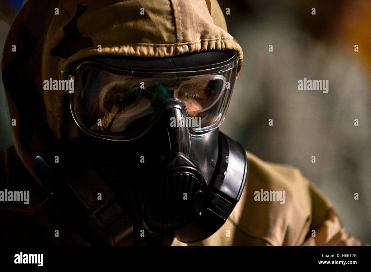 Staff Sgt. Timothy Clay looks down at the simulated contamination ...