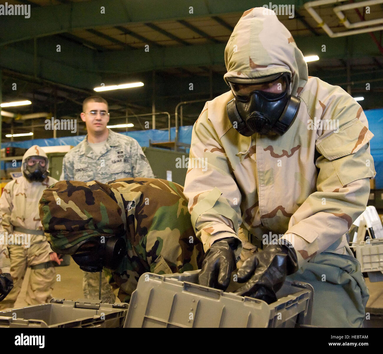 Team Dover members simulate decontamination procedures during a ...