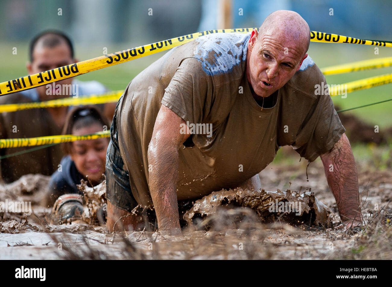 James Black, 39th Contracting Squadron, exits the first of several mud ...