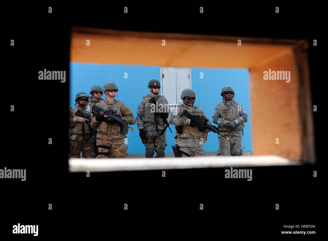 Combat Airman Skills Training students, stand outside a building after ...