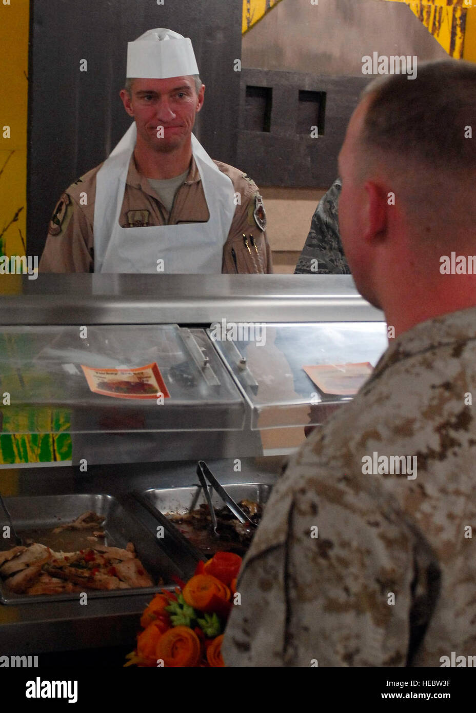 Air Force and Army leadership serve meals to servicemembers during ...