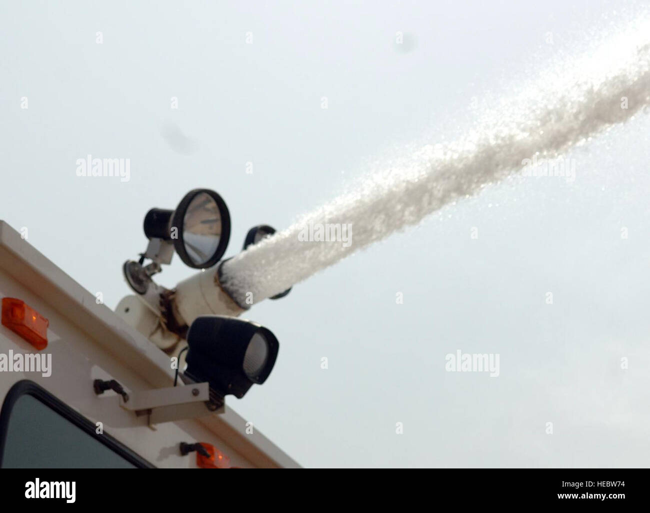 Water jets from the turret atop a fire truck, belonging to the Camp ...