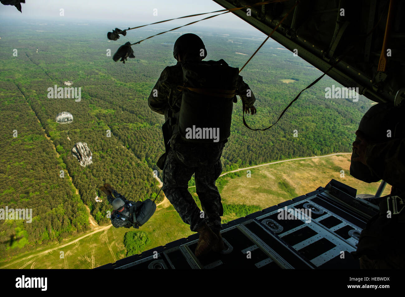 U.S. Army soldiers, 5th Special Forces Group, jump from a C-130J Super ...