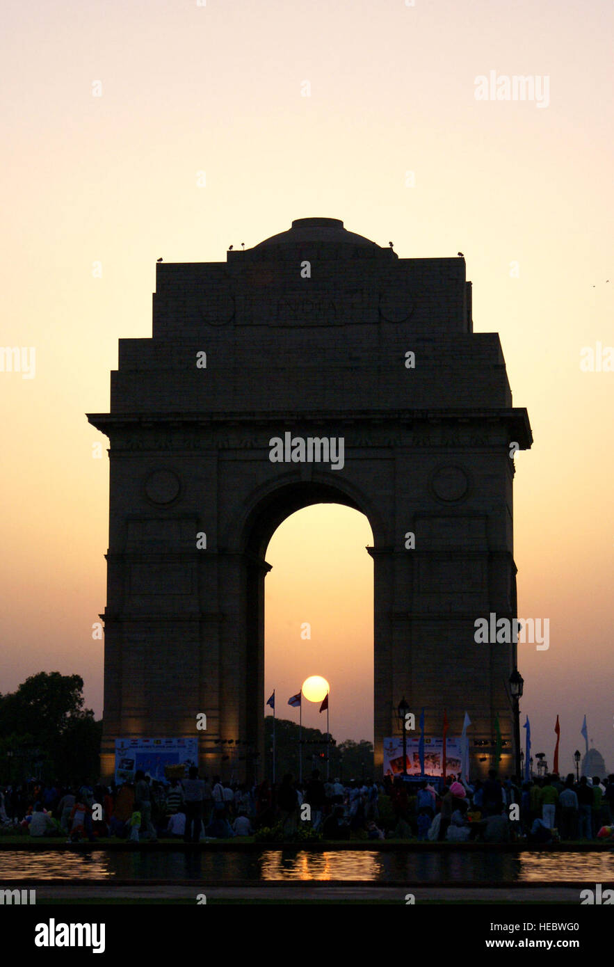The sun sets behind the India Gate in New Delhi March 17, setting the ...