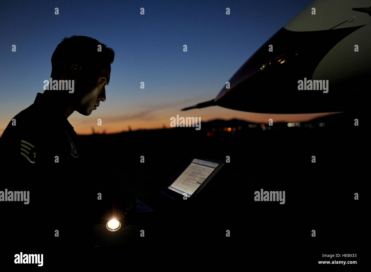 Staff Sergeant Bosco Bae, Thunderbird dedicated crew chief, reviews a ...