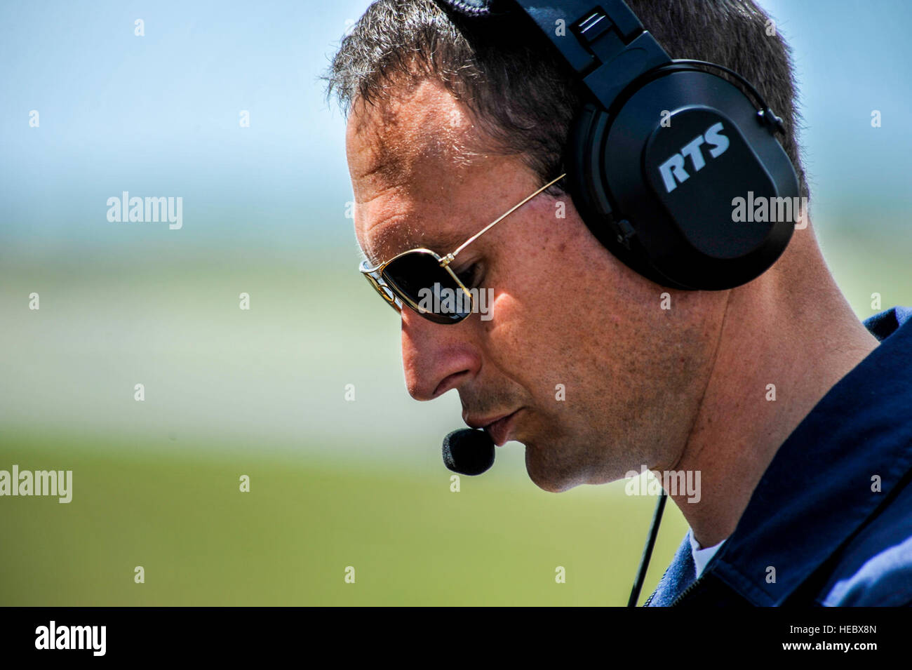 Thunderbird 7, Maj. Tyler Ellison, listens to radio feedback from the ...