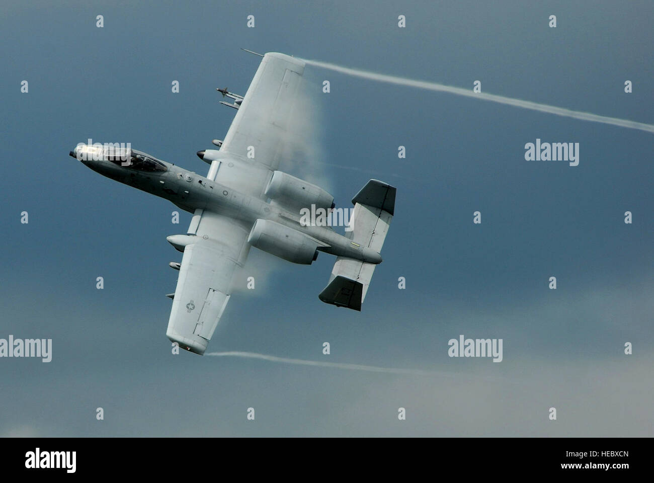 An A-10 Thunderbolt II conducts a low-level strafing run over ...