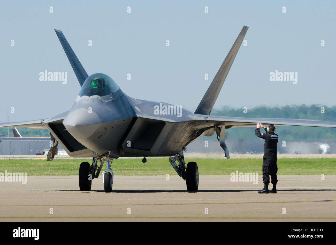 A crew chief for the U.S. Air Force F-22 Raptor Demo Team provides ...