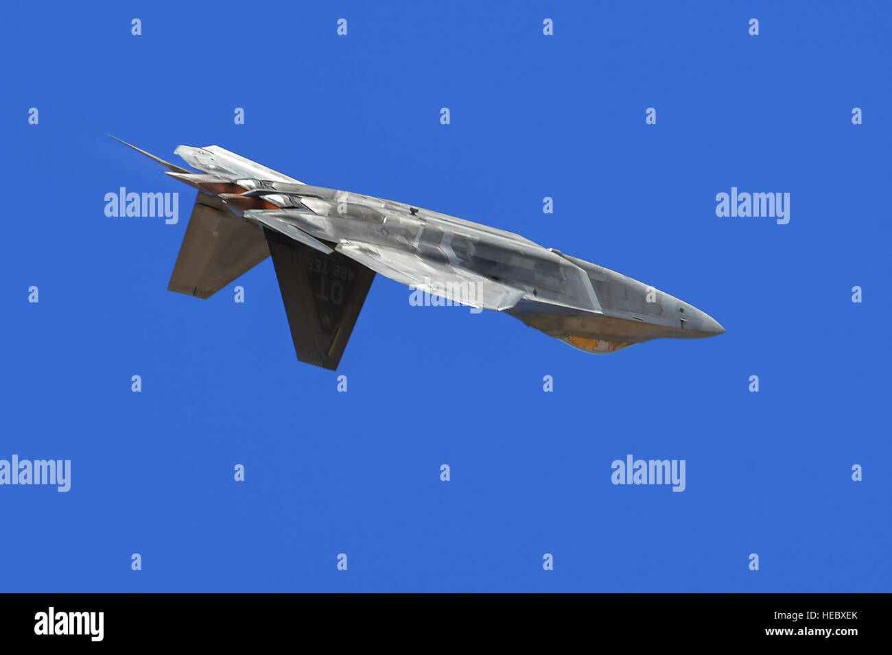 A U.S. Air Force F-22 Raptor performs an aerial demonstration during ...