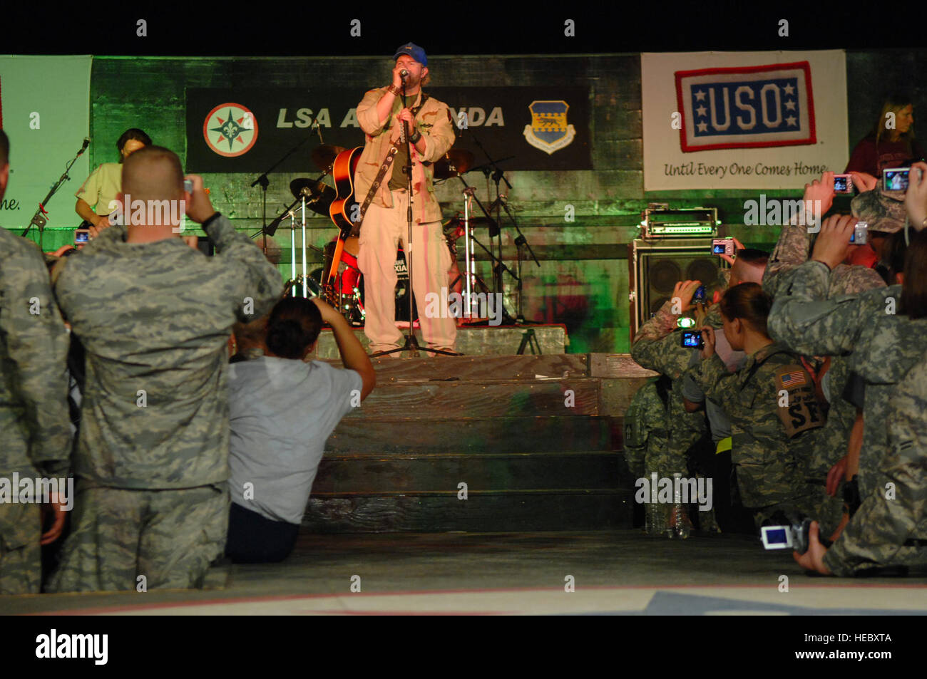 BALAD AIR BASE, Iraq -- Country music superstar Toby Keith sings to a ...