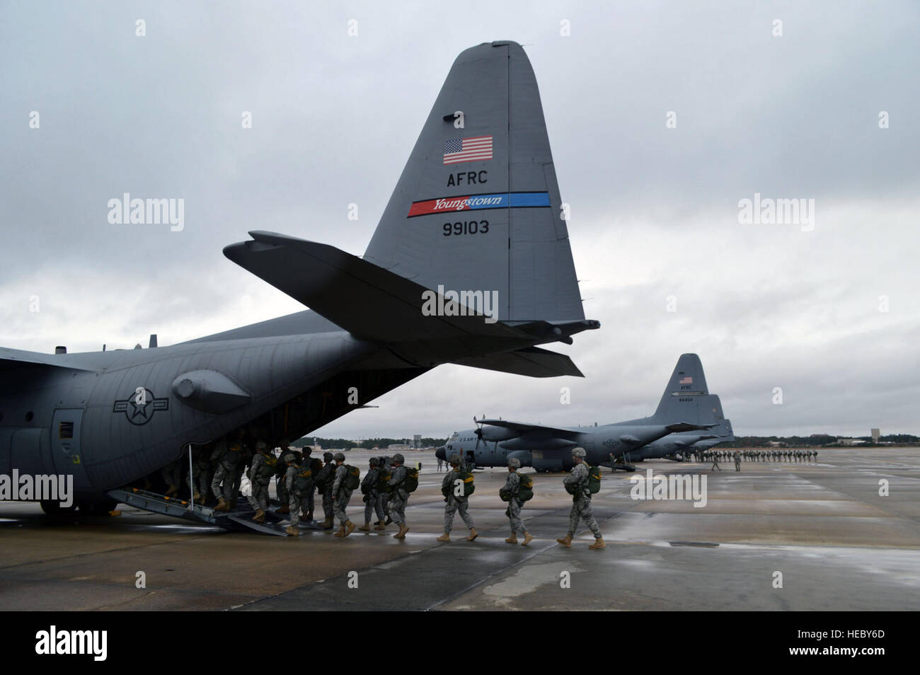 U.S. Army paratroopers from Fort Bragg, N.C. load onto a C-130H ...