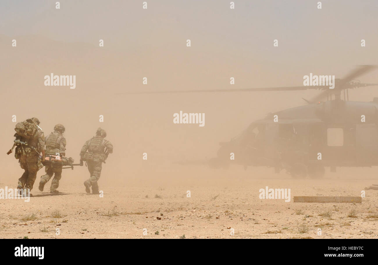 Pararescuemen assigned to the 306th Rescue Squadron quickly take a ...