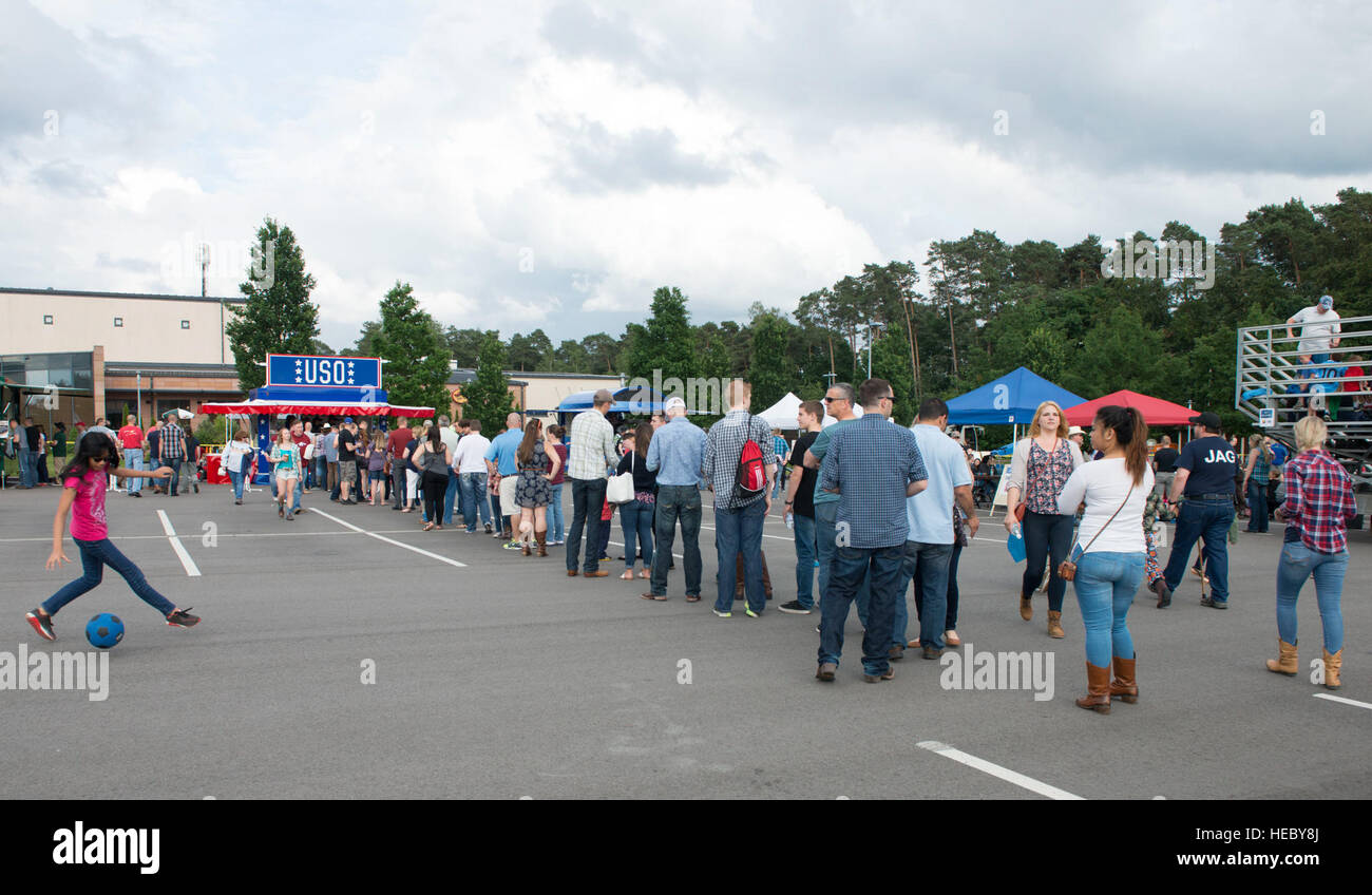 Service members and families attend a USO-sponsored event at Ramstein ...