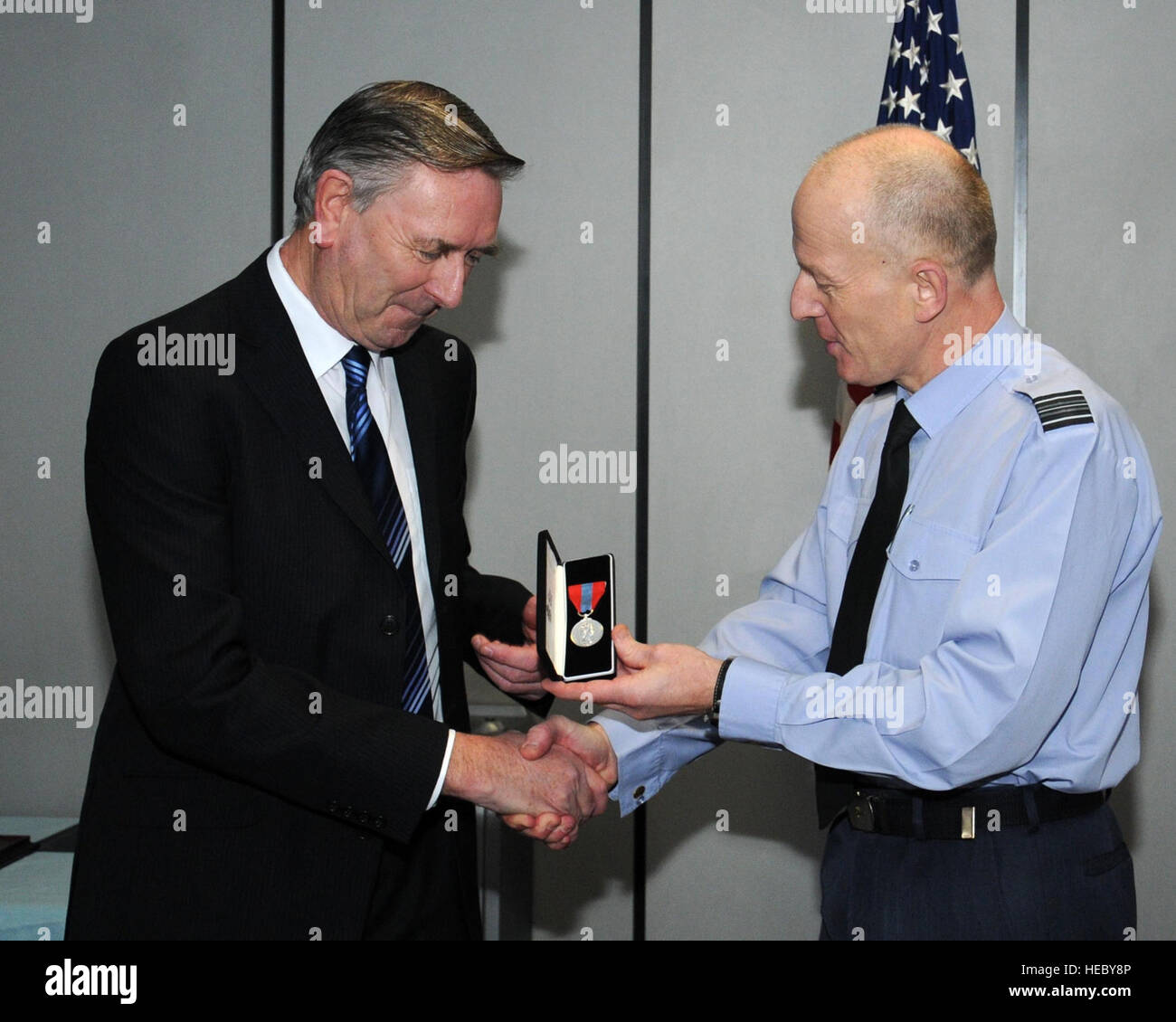 RAF Sqn. Ldr. Rick Fryer, right, RAF Mildenhall station commander ...