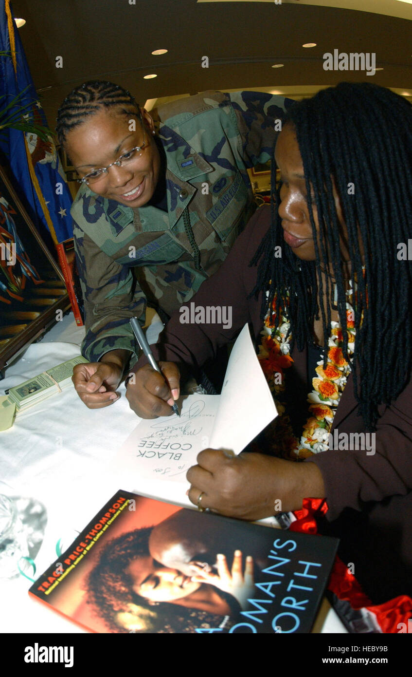Author Tracy Price-Thompson (right) signs a book for 1st Lt. Joy Morgan ...