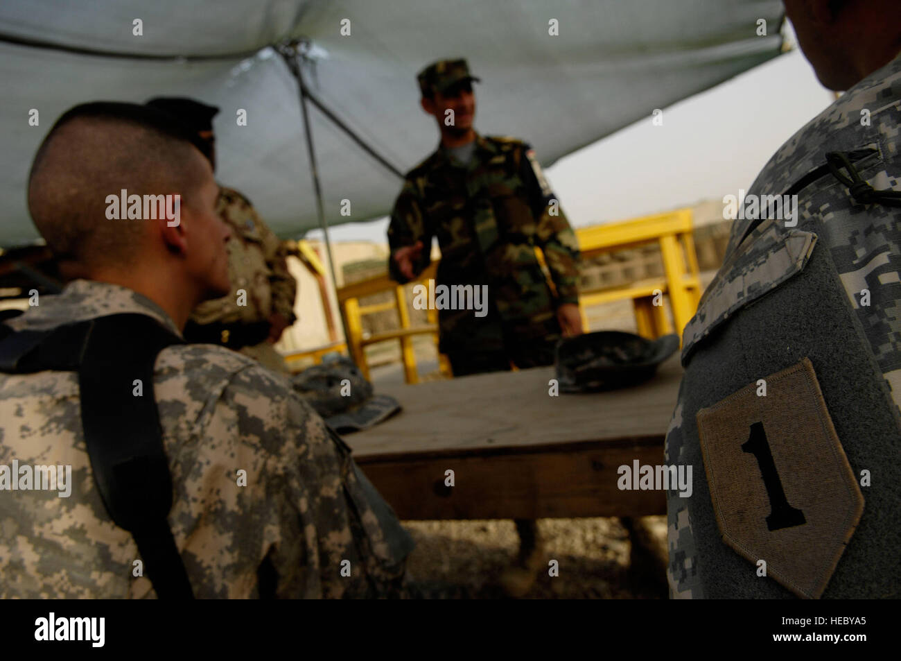 Iraqi police instructors with the Mosul public service academy receive ...