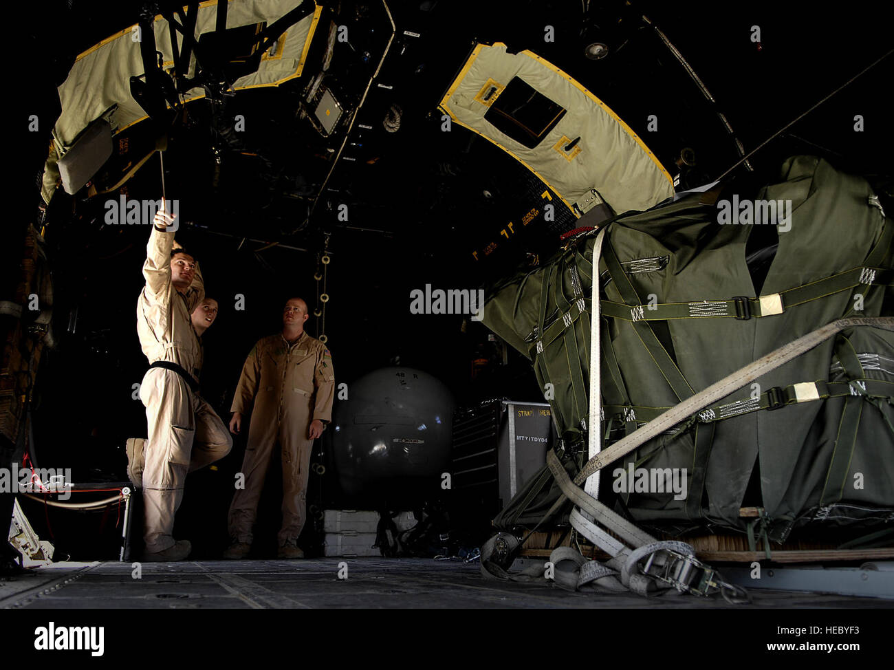 Loadmasters Senior Airman Geoffery Koppel and Justin Gielski along with ...