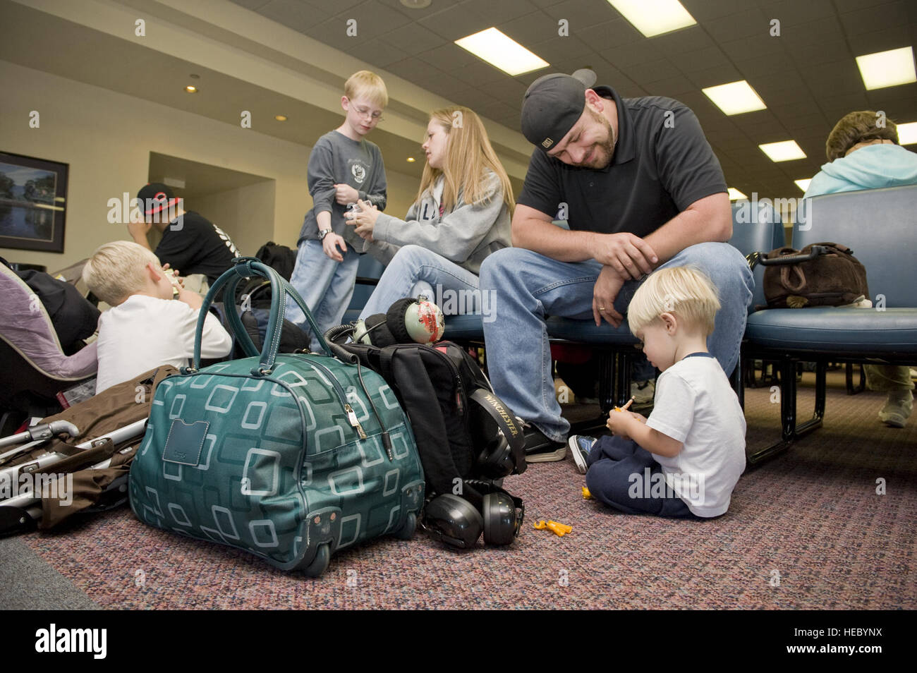 The Comer family in the passenger terminal at Travis Air Force Base ...