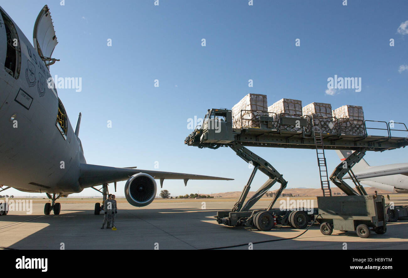 A 60k Tunner loader bearing a cargo of individual field rations pulls ...