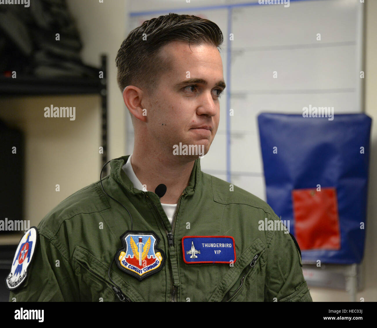 Brendan Lyons, Tucson community hometown hero, listens to a briefing ...