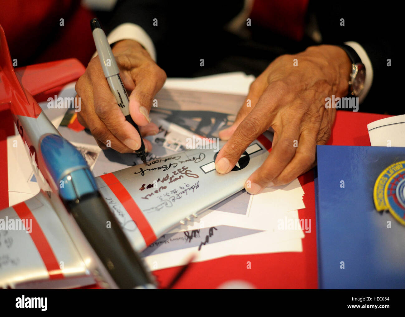 Tuskegee Airman signs a 'Red Tail' during Black History Month events at ...