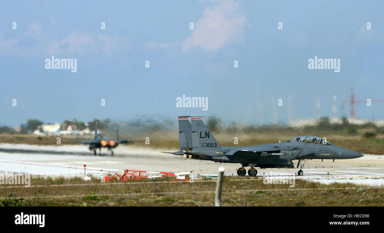 Two F-15E Strike Eagle aircraft taxi at Souda Air Base, Greece, during ...
