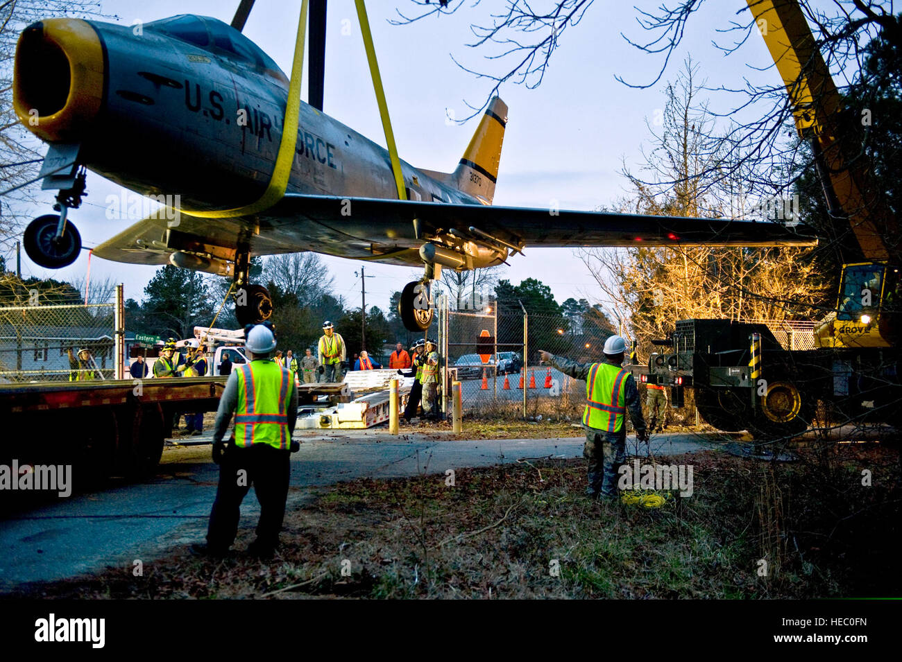 U.S. Airmen assigned to the 4th Equipment Maintenance Squadron lift an ...