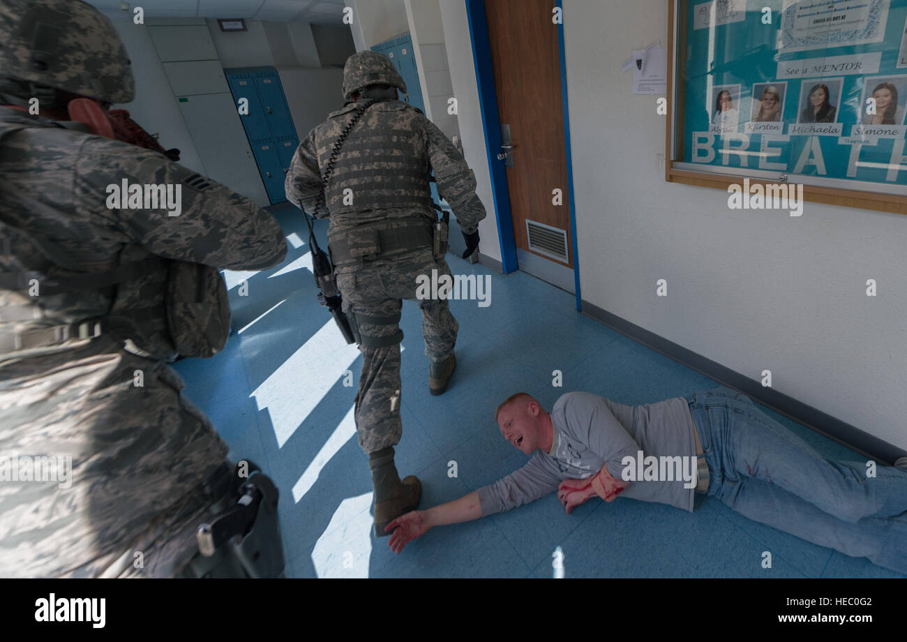 Airmen from the 86th Security Forces Squadron clear a building during ...
