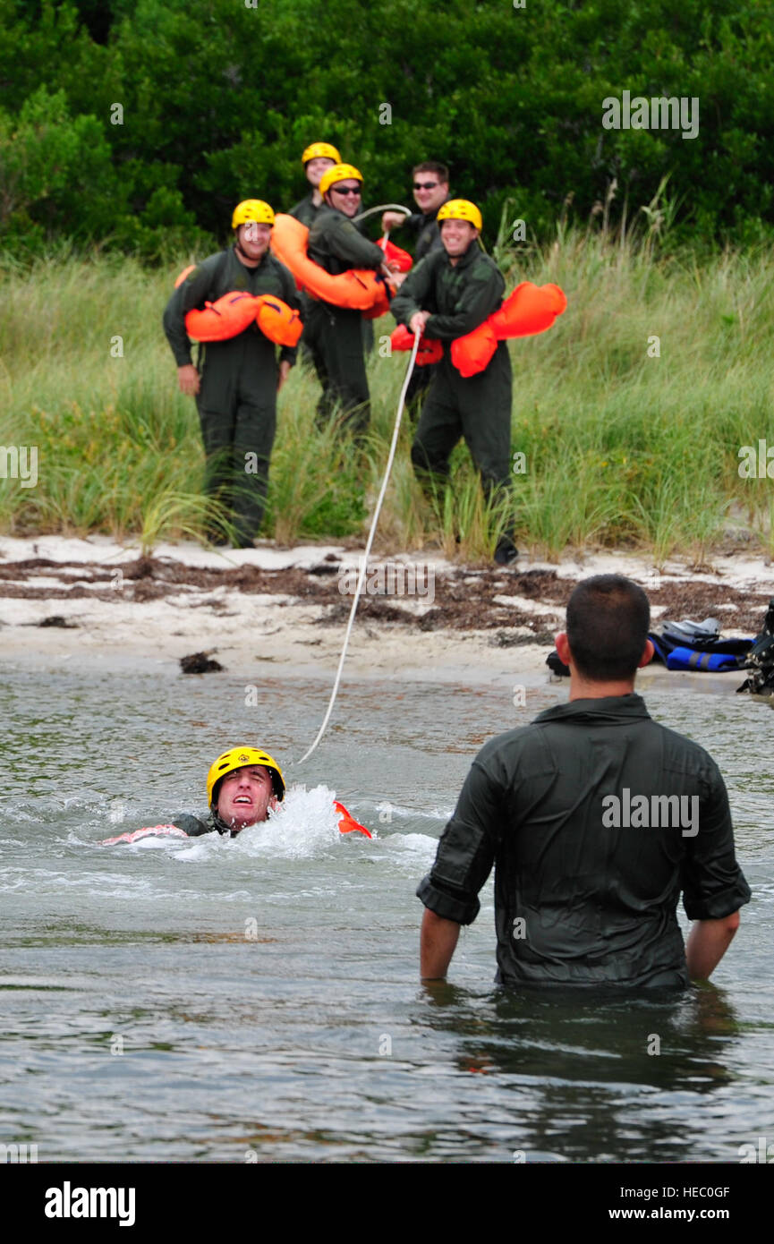 Airmen from the 305th Air Mobility Wing conduct water survival training ...