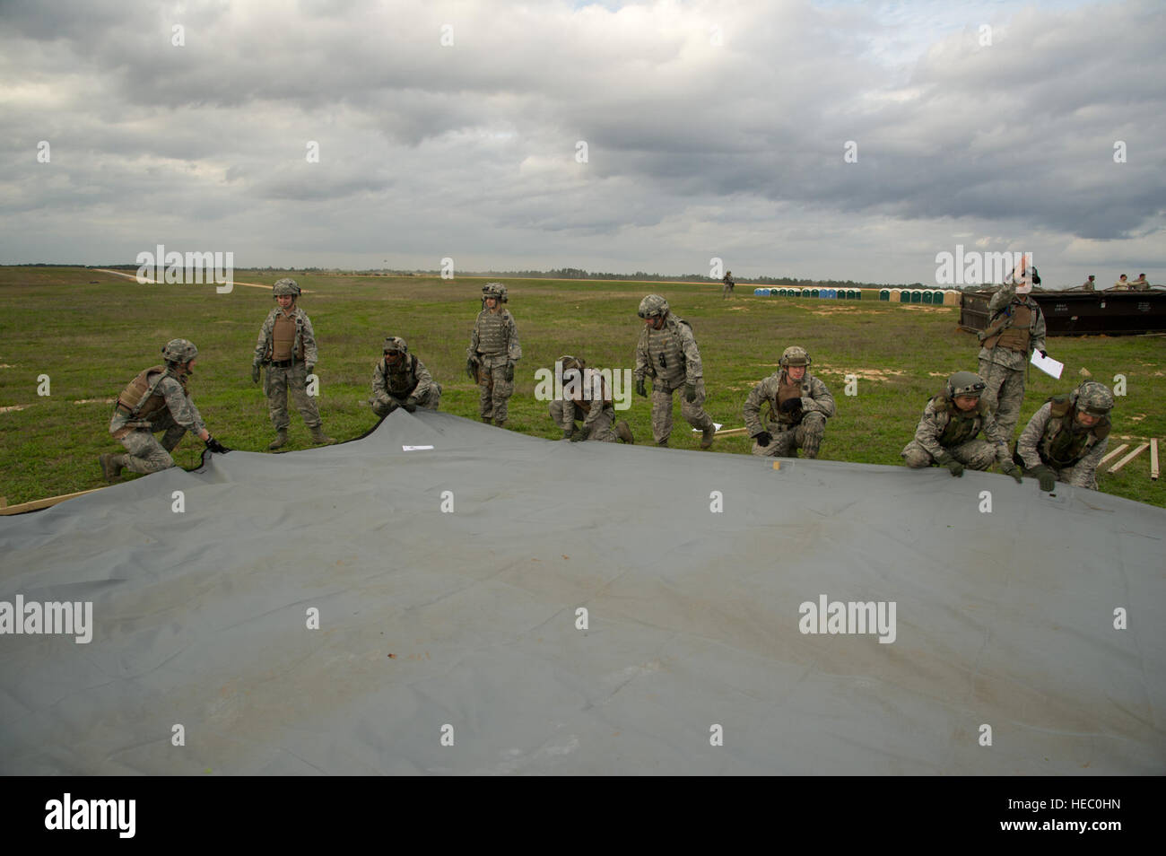 U.S. Airmen put up a tent during Joint Readiness Training Center (JRTC ...